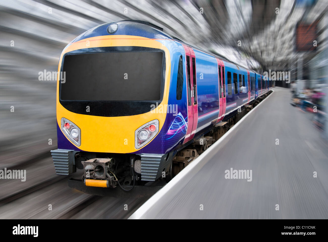 Modern Passenger Commuter Transport Train with Motion Blur Stock Photo ...