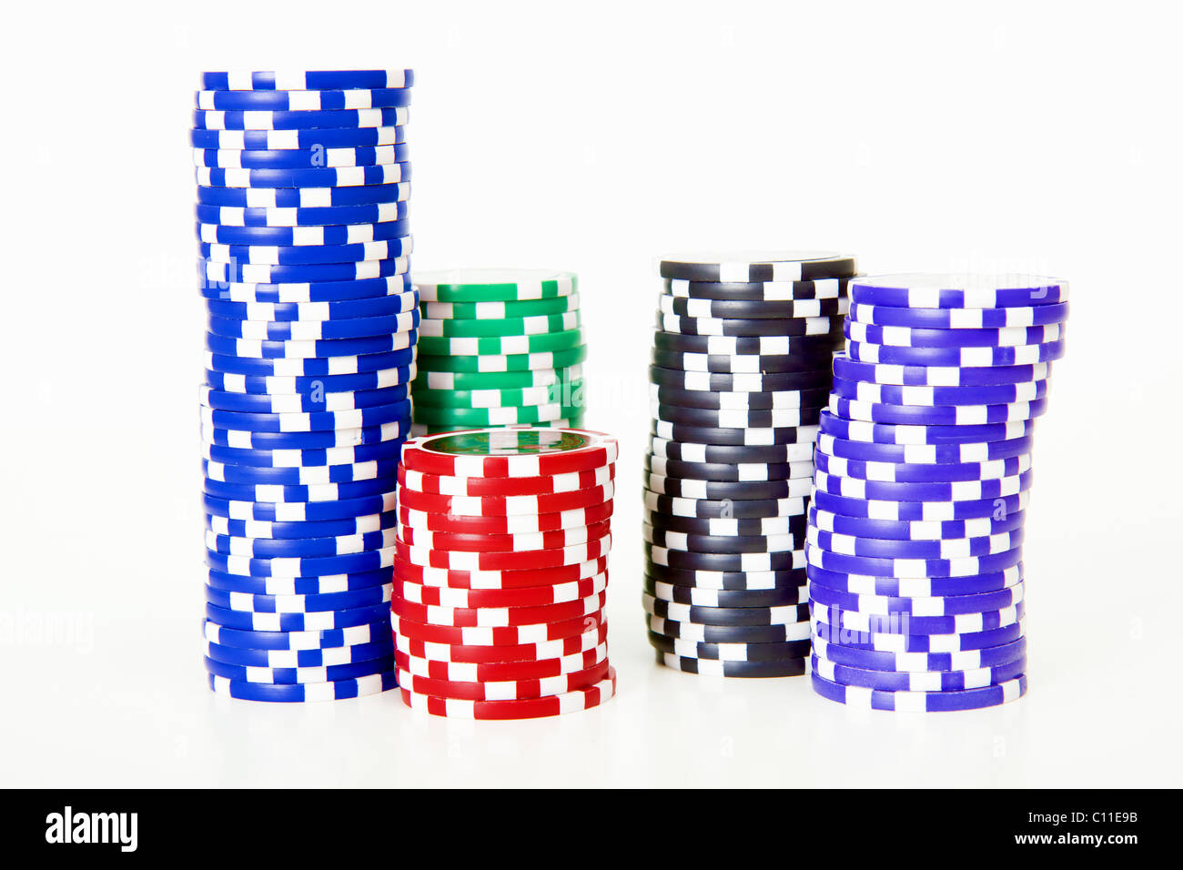stack of poker chips on a light background Stock Photo - Alamy