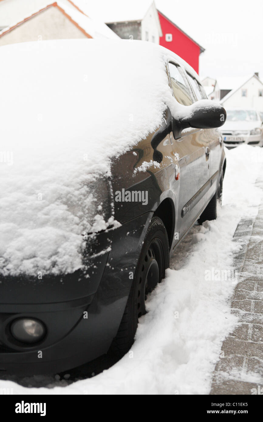 Black car covered with snow, winter, Germany Stock Photo - Alamy