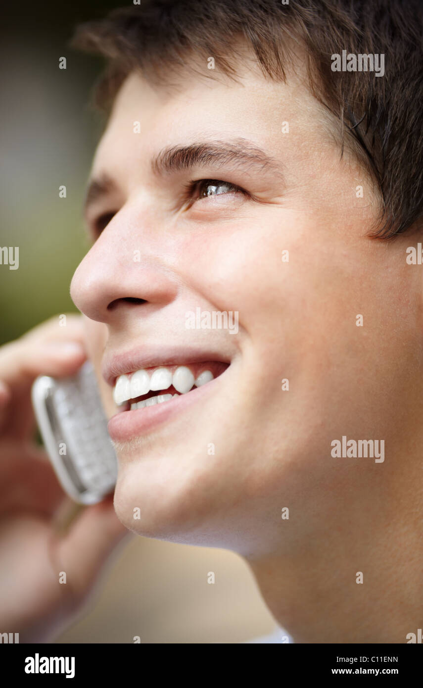 portrait of young man with cell-phone Stock Photo - Alamy
