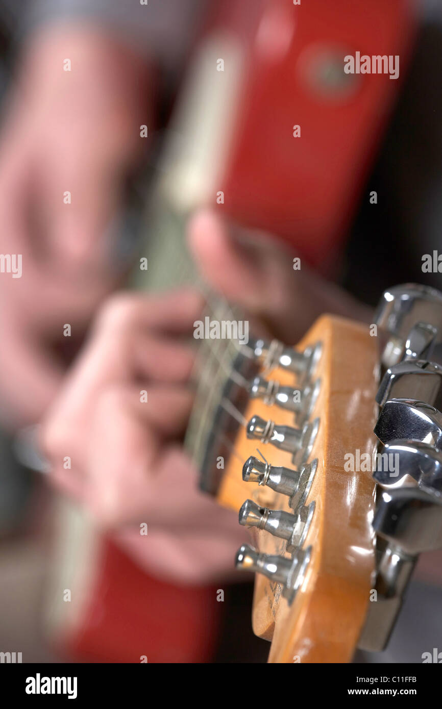 Playing vintage electric telecaster fender guitar. Looking down the ...