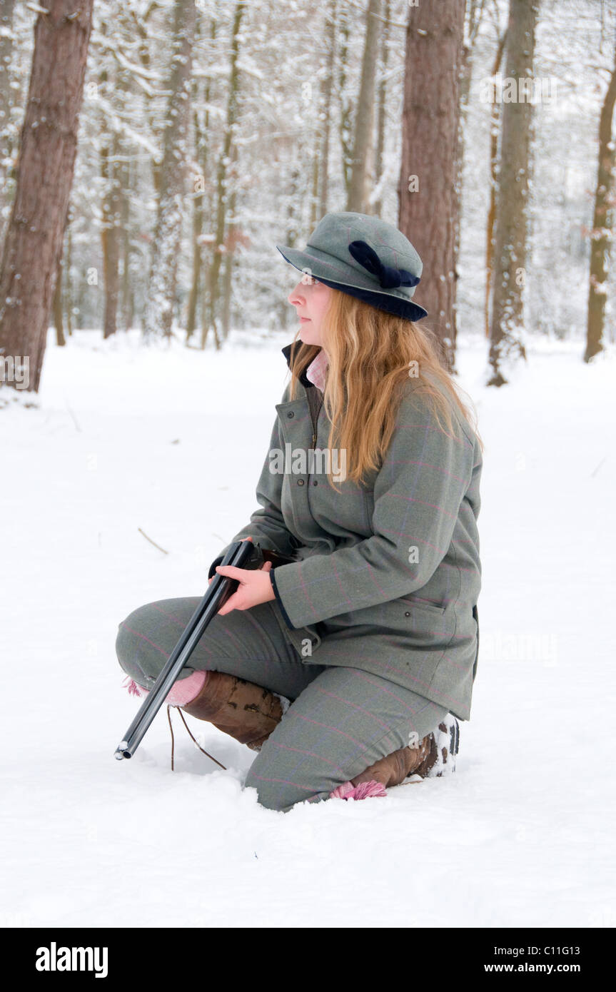 Woman shotgun snow hi-res stock photography and images - Alamy
