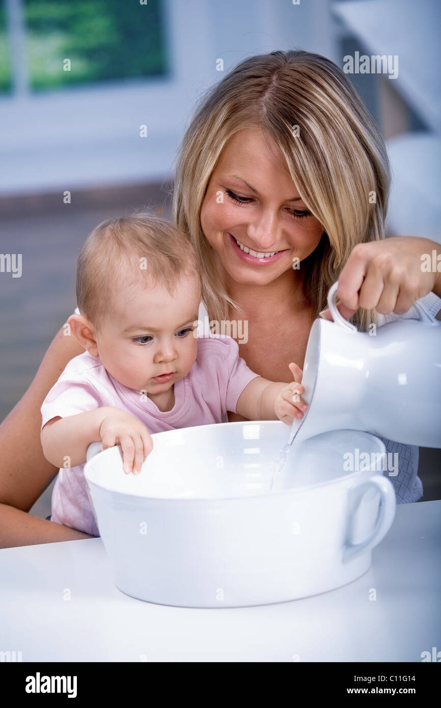 Mother father baby bath hi-res stock photography and images - Alamy