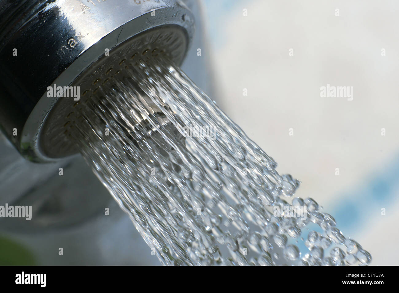 Silver reflection Running tap close-up Stock Photo - Alamy