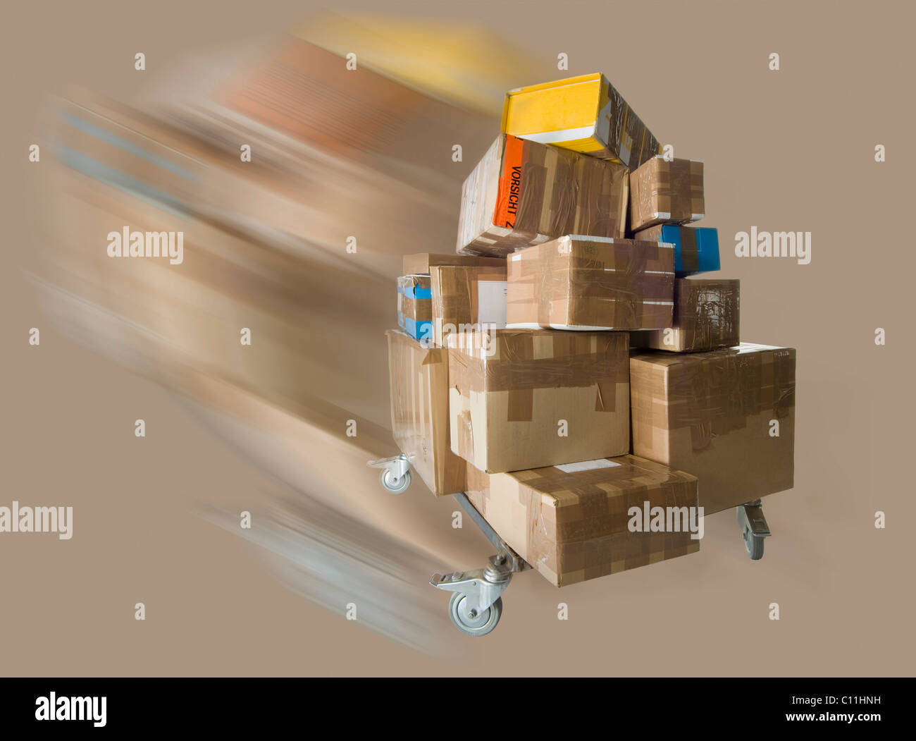 Packages on a push cart Stock Photo - Alamy