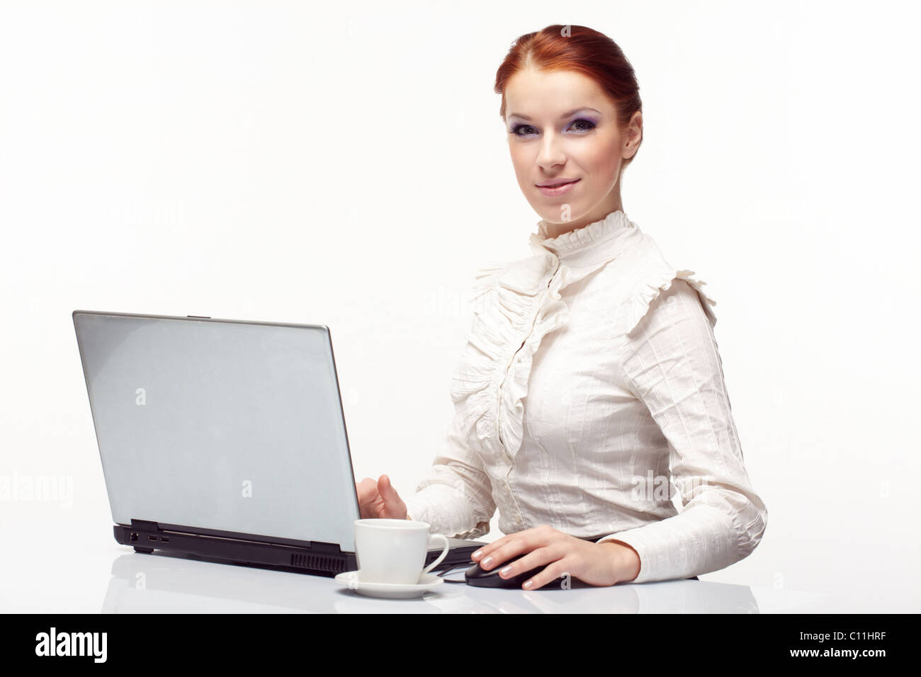 Business woman working on her laptop Stock Photo - Alamy