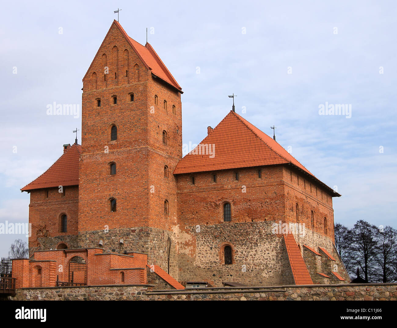Medieval castle tower on the island surrounded by water in Trakai ...