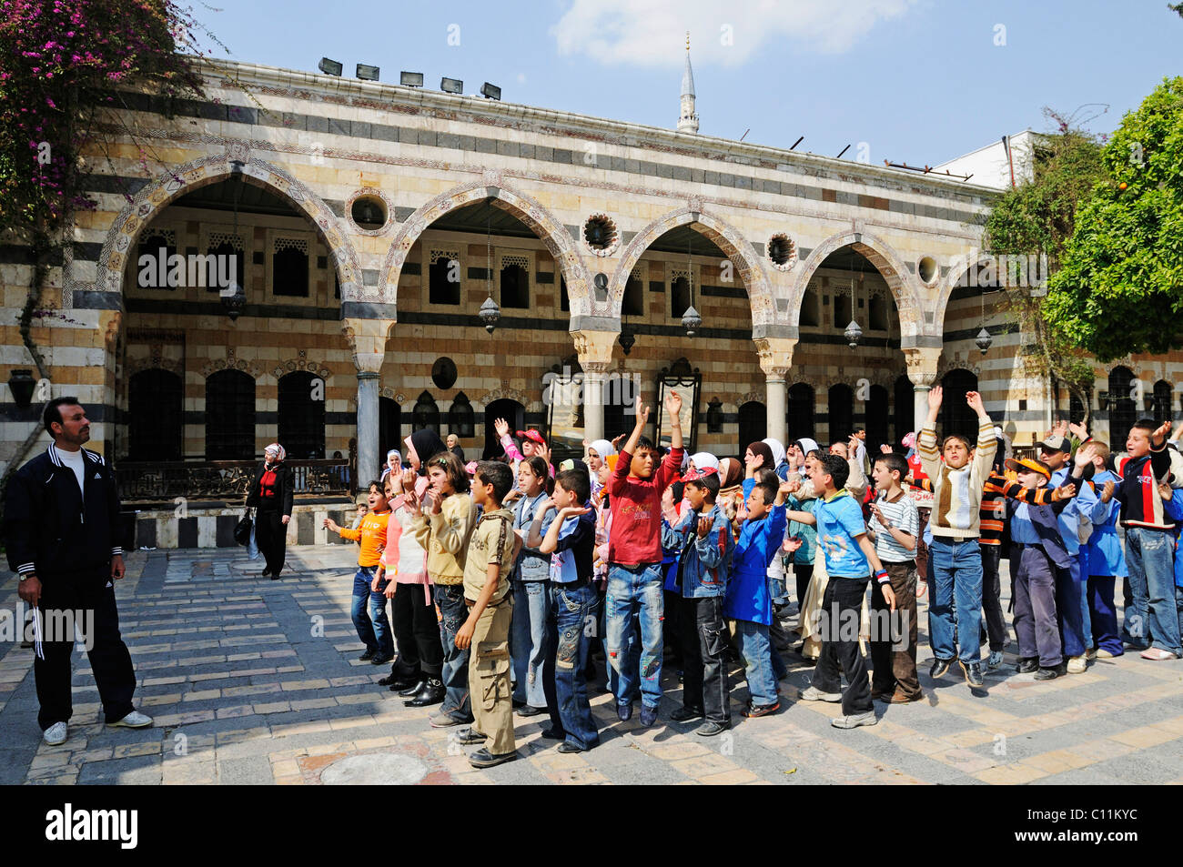 Pupils with their teacher in the courtyard of the Azm Palace, Azem ...