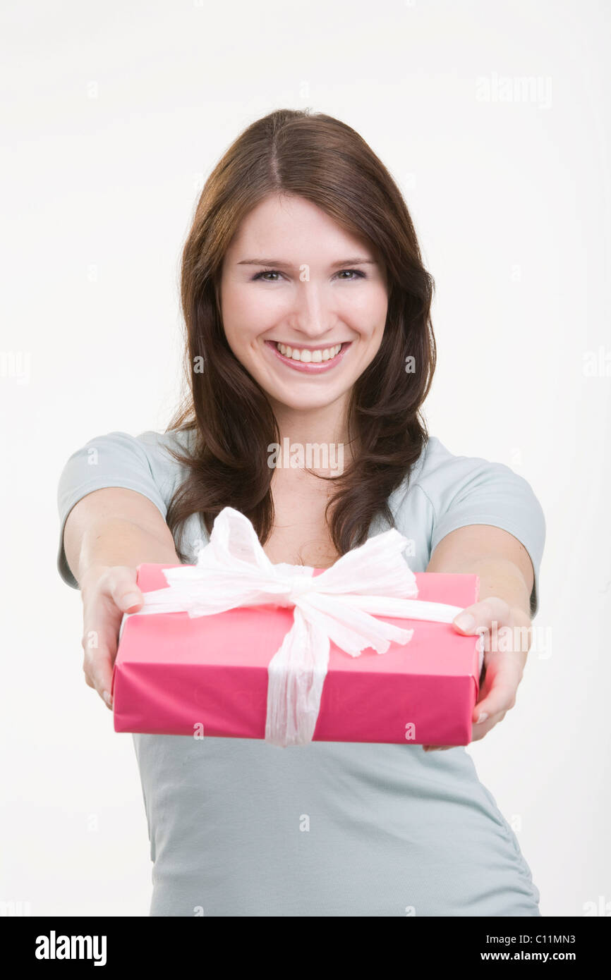 Woman with gift Stock Photo - Alamy