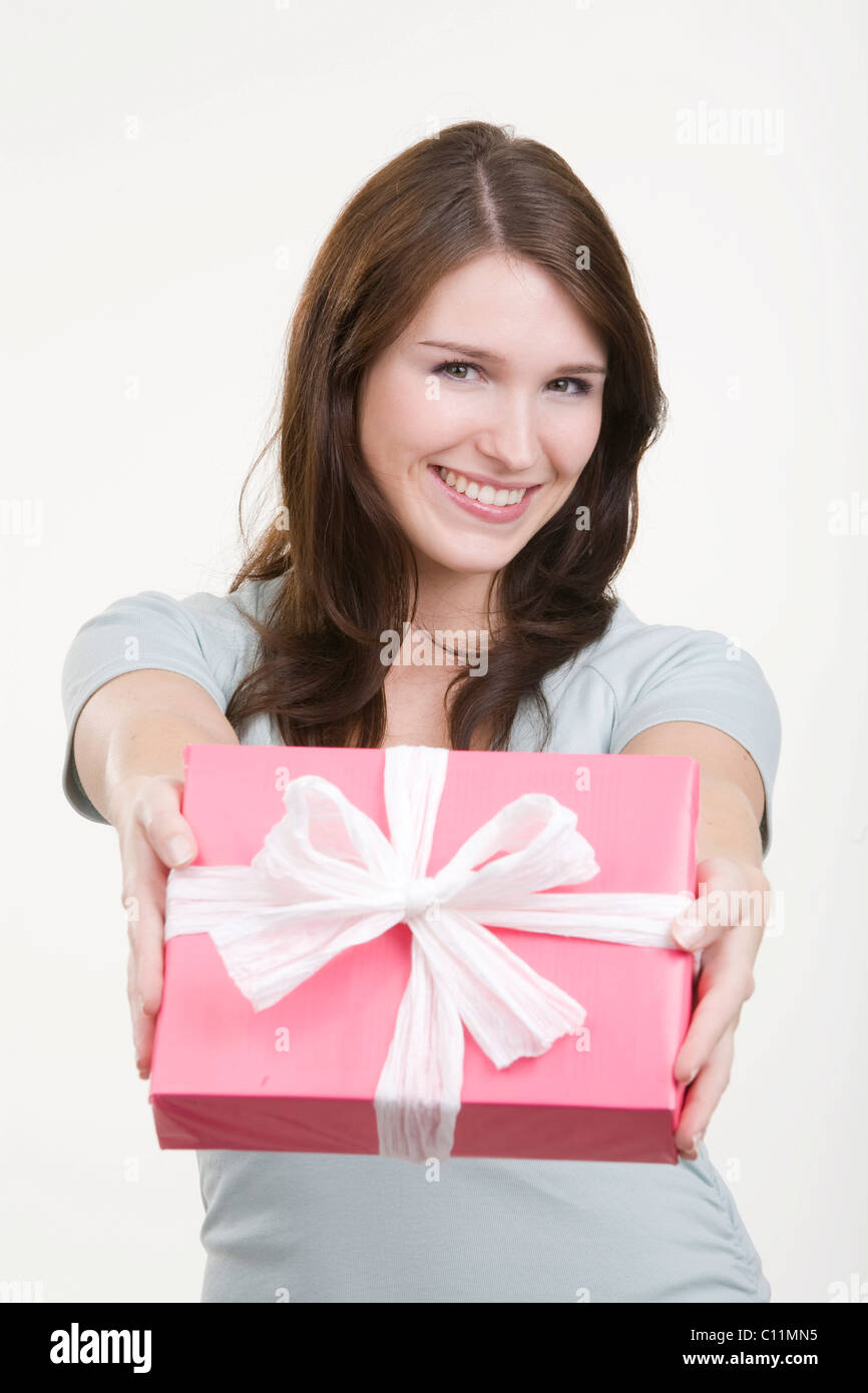 Woman with gift Stock Photo - Alamy