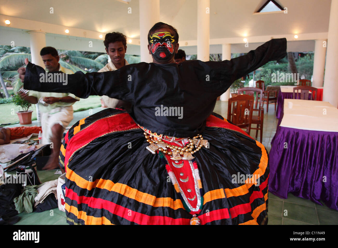 Kathakali dancer dressing, Chuvanna Thaadi character, Kerala, southern ...