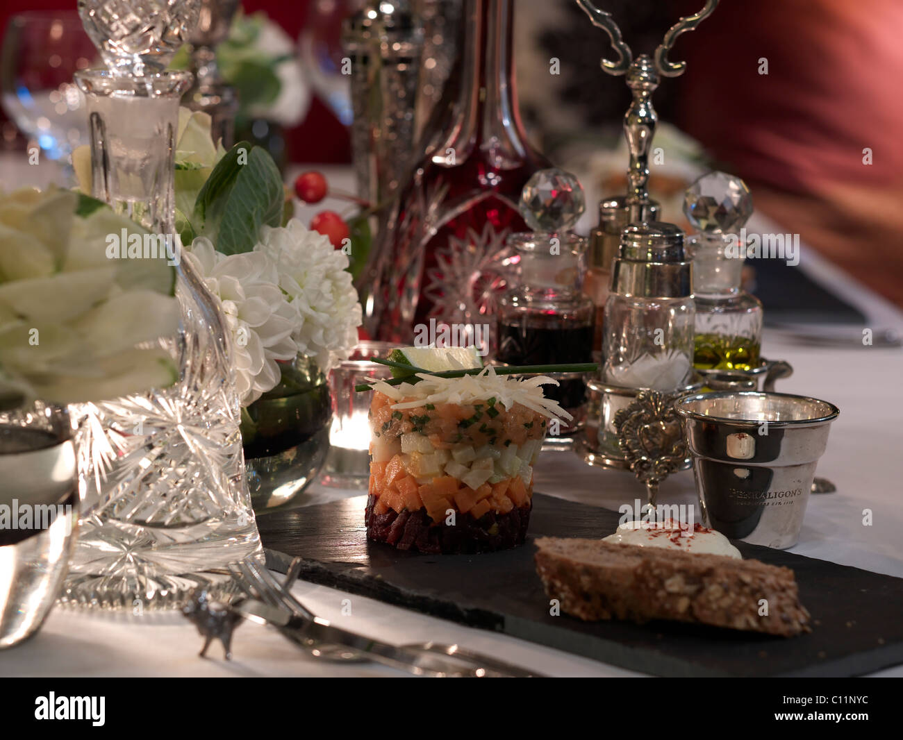 Stylish set table in an upscale ambience with culinary speciality Stock ...