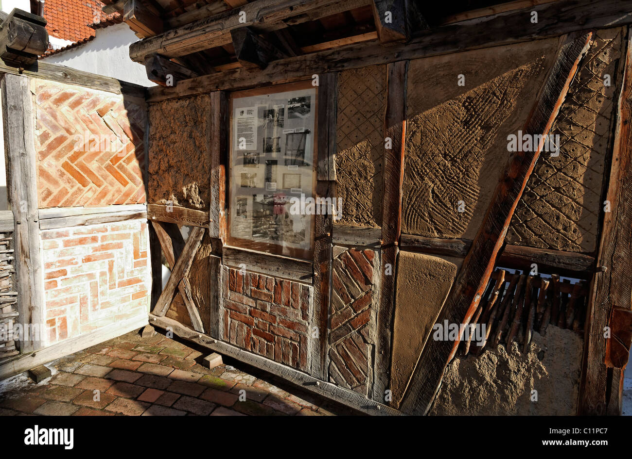 Wattle and daub masonry, layer of clay plaster and bricks, 'Staenderbau ...