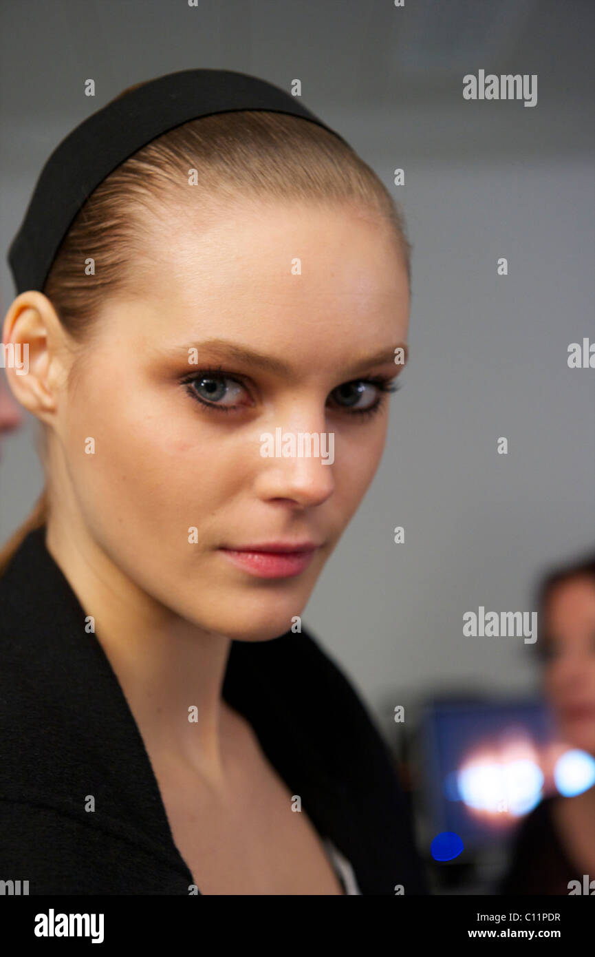 Models line up backstage before Jonathan Saunders autumn 2011 ...