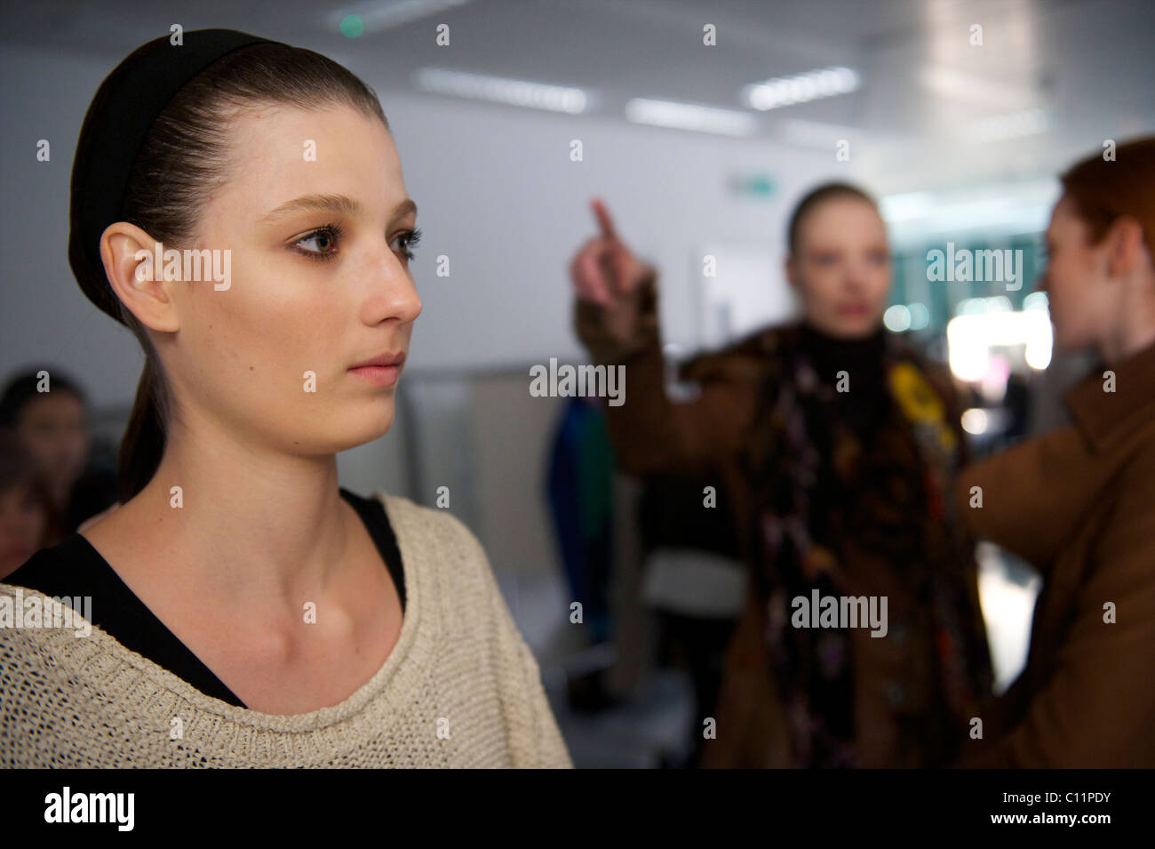 Models line up backstage before Jonathan Saunders autumn 2011 ...