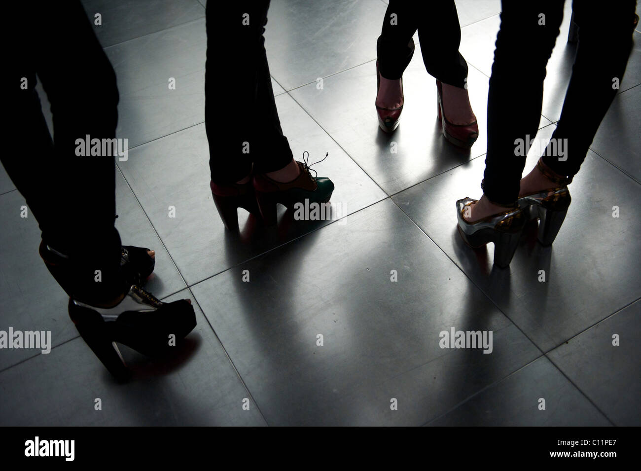 Models line up backstage before Jonathan Saunders autumn 2011 ...
