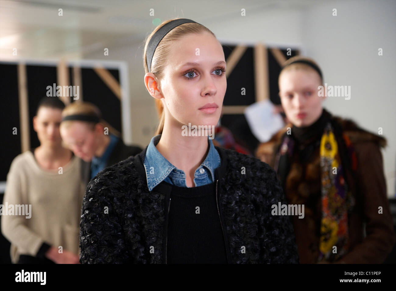 Models line up backstage before Jonathan Saunders autumn 2011 ...