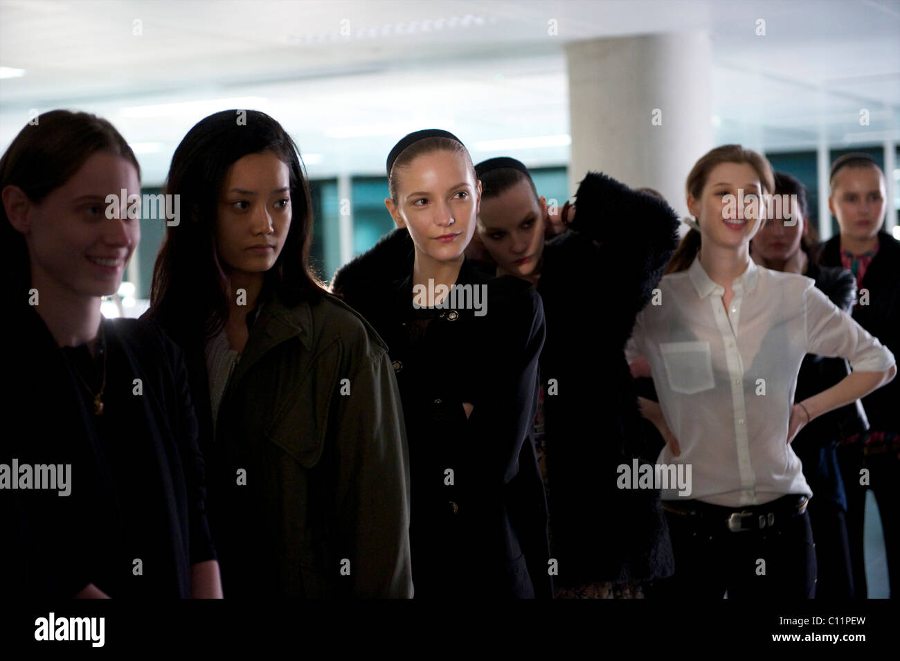 Models line up backstage before Jonathan Saunders autumn 2011 ...