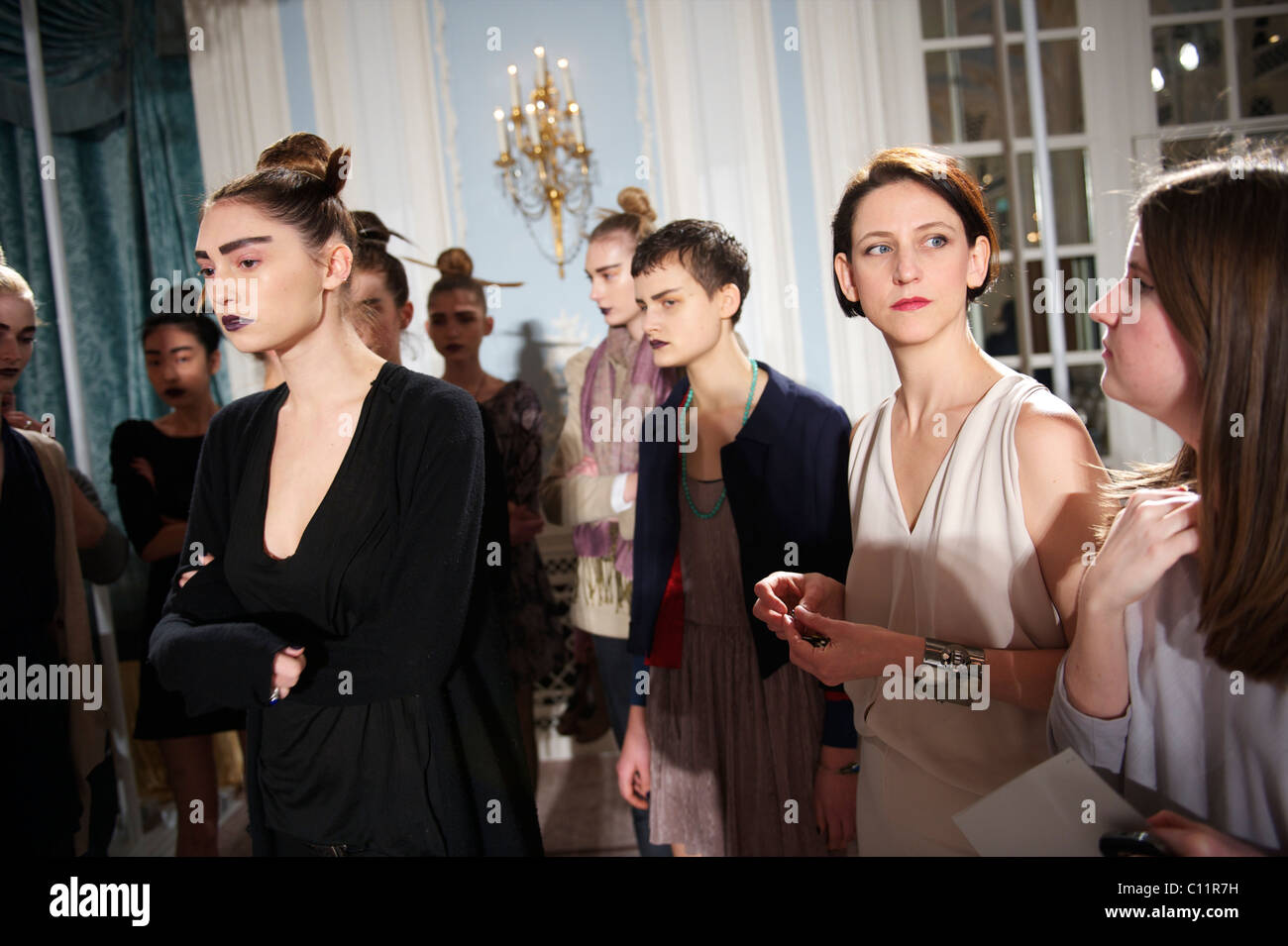 Models and designer Maria Grachvogel (second from right) participate in ...