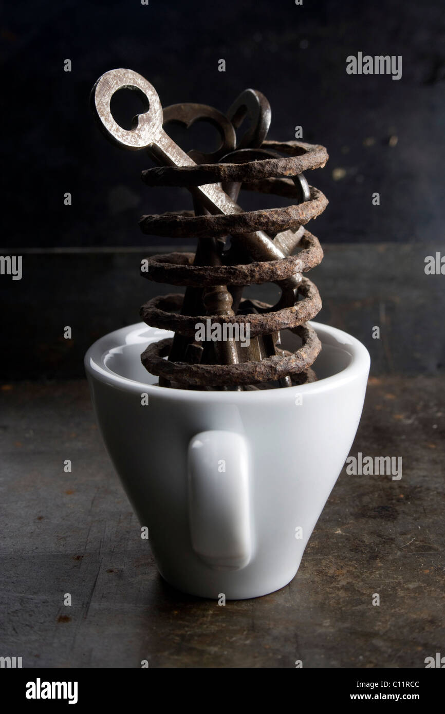 Coffee cup and old keys Stock Photo - Alamy