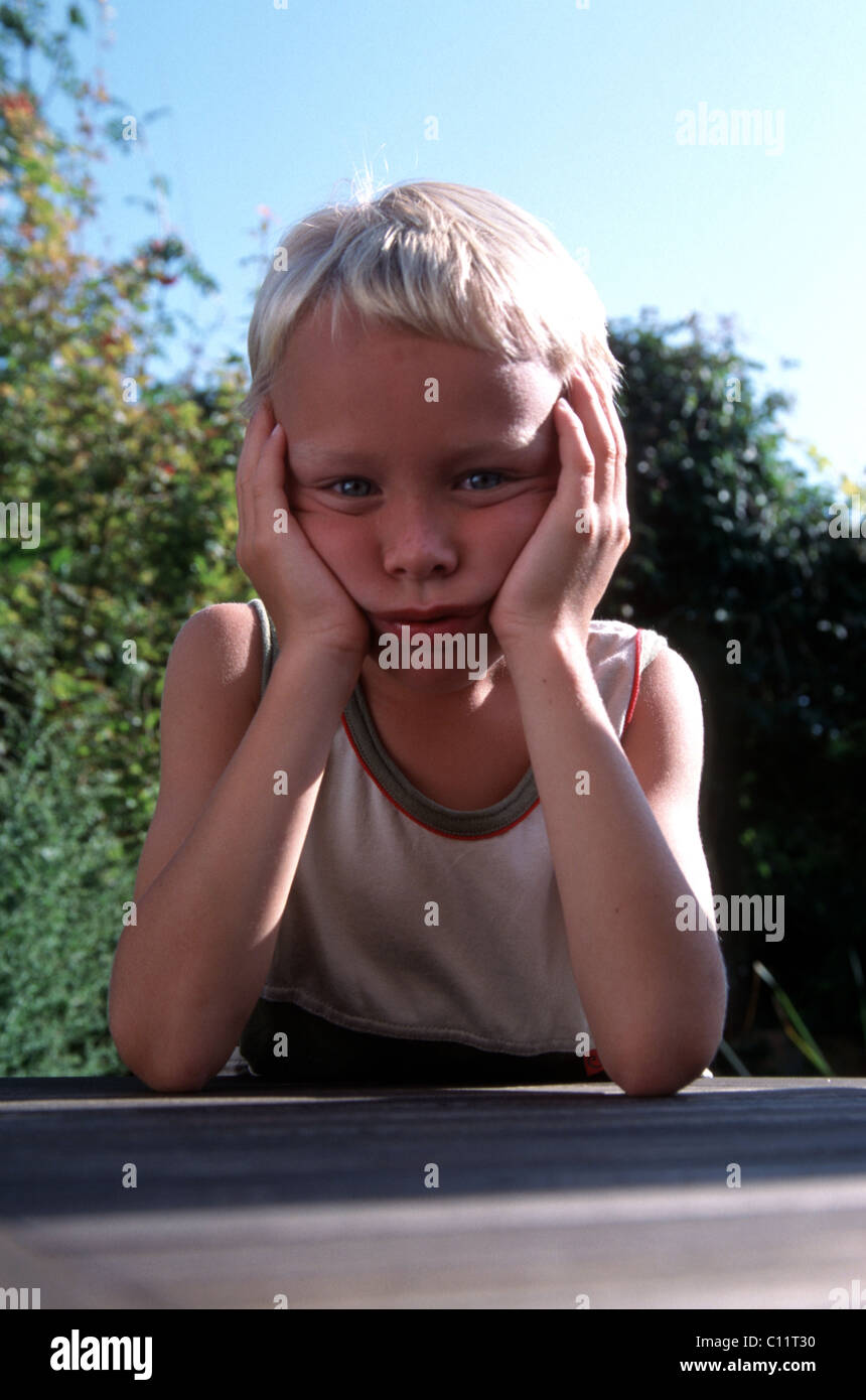 Boy leaning head back hi-res stock photography and images - Alamy