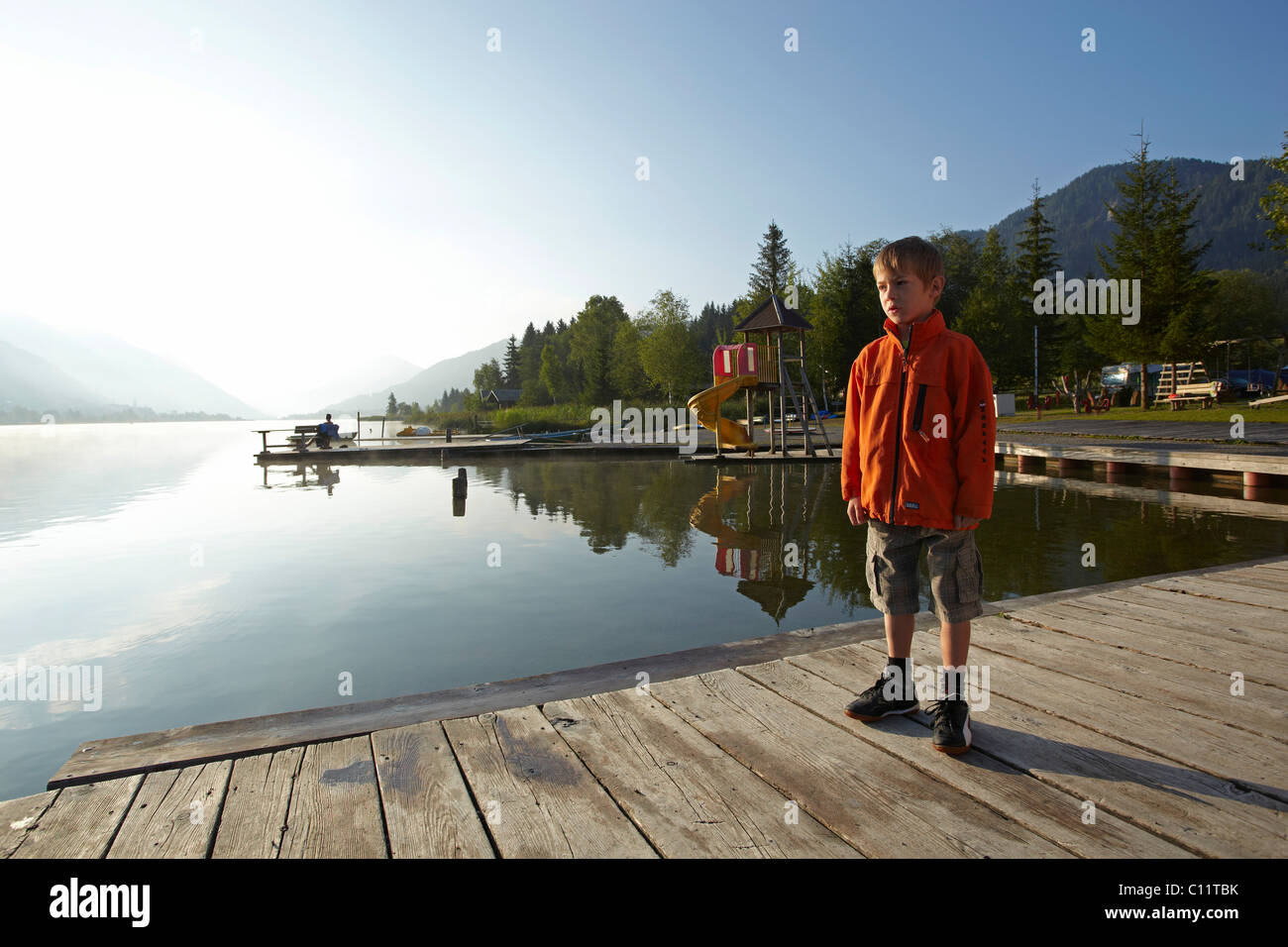 Child in the morning, Weissensee Lake, Carinthia, Austria, Europe Stock ...