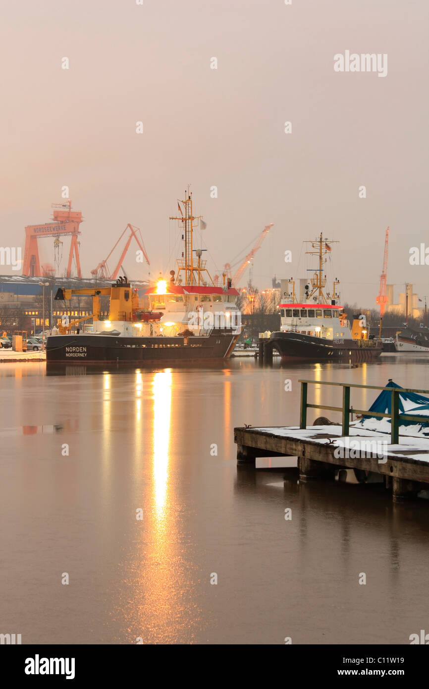 Harbor view with the ship of the maritime police, crane of the North ...