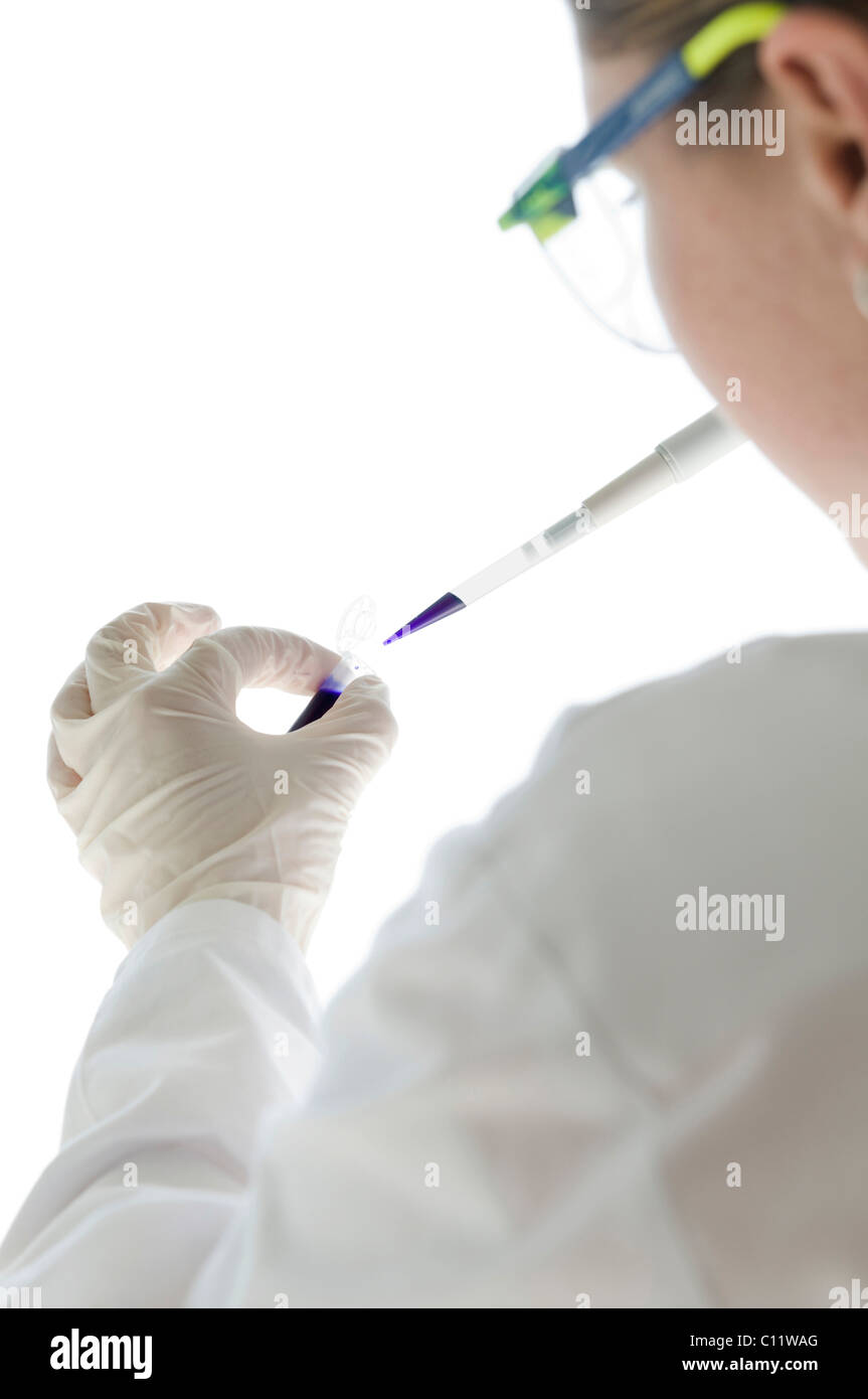 Scientist with pipette Stock Photo - Alamy