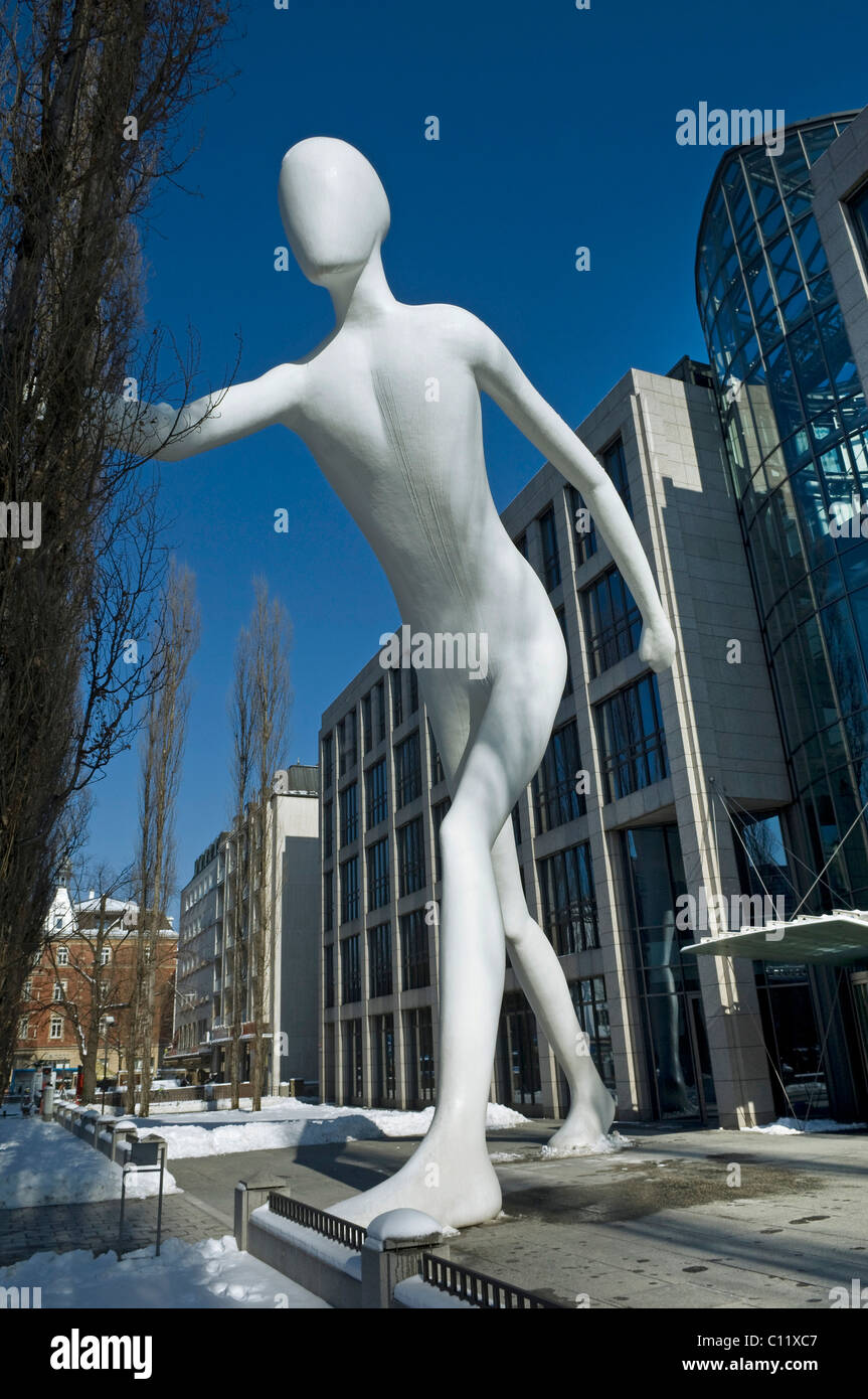 Walking man sculpture munich germany hi-res stock photography and ...