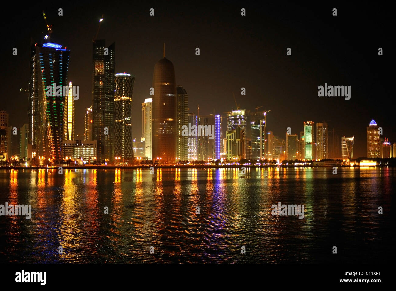 Night shot of the Doha skyline, Doha, Qatar, Persian Gulf, Middle East ...