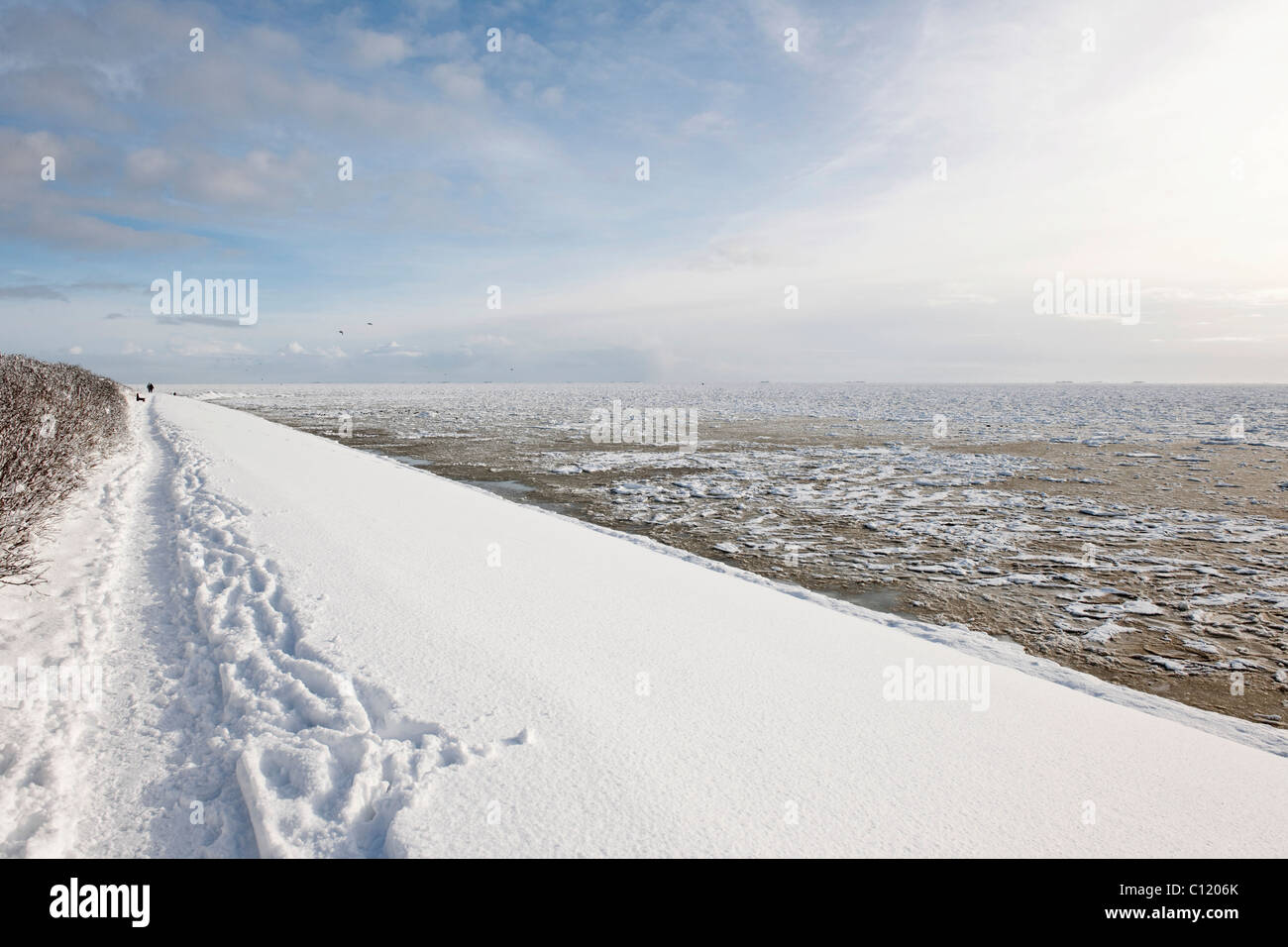 Deep snow and ice on the ocean, North Sea island of Foehr, Nationalpark ...