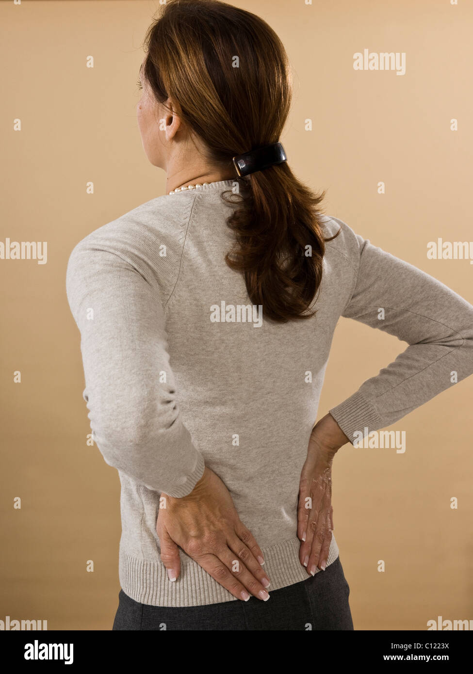 Woman and backache hi-res stock photography and images - Alamy