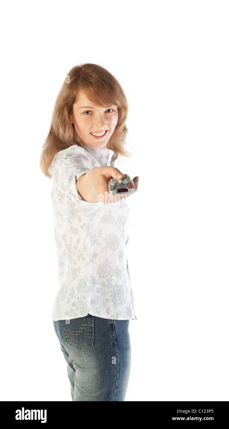 Pretty young blond woman aiming TV remote control; isolated on white ...