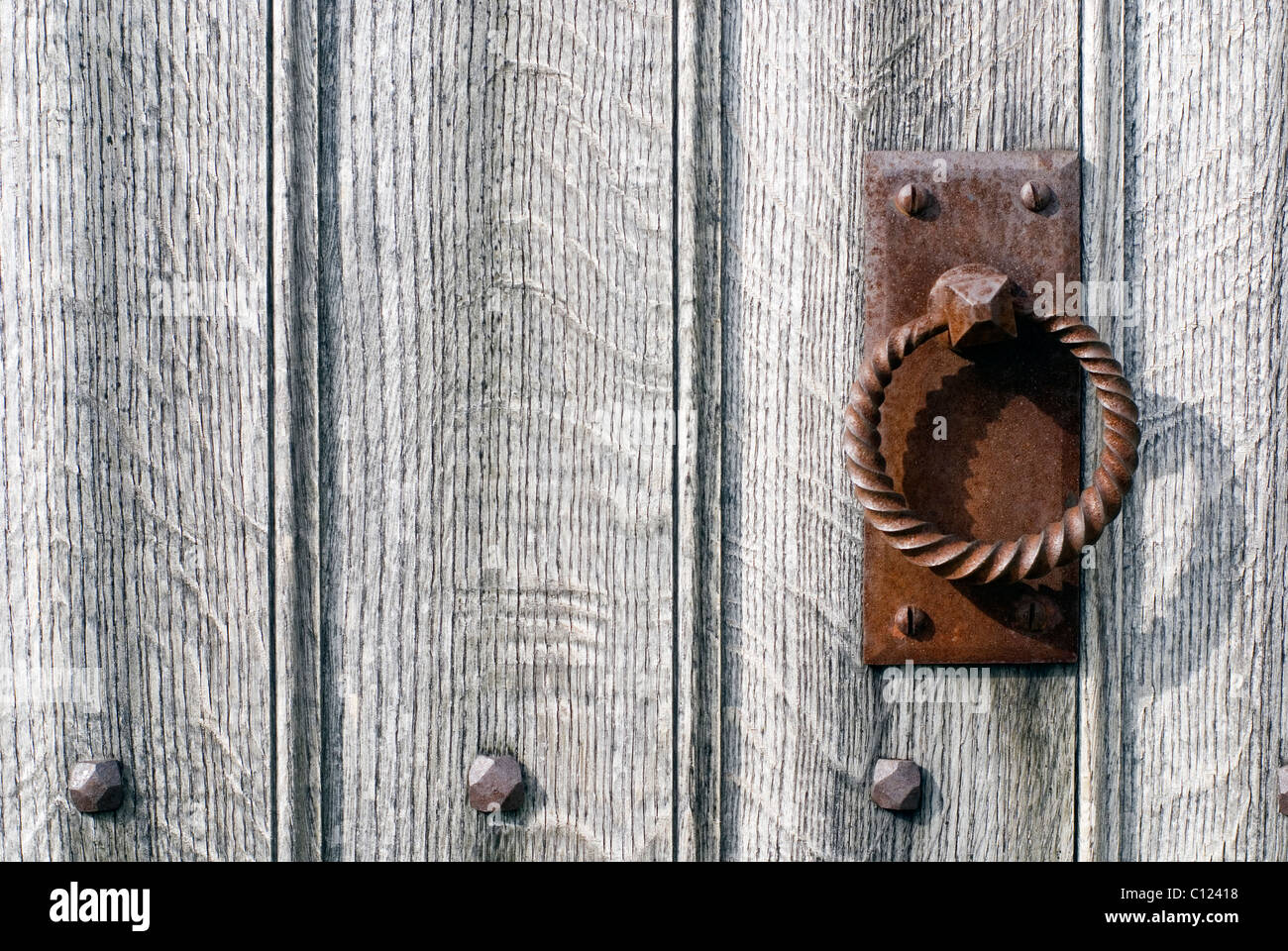 Old rustic door handle Stock Photo - Alamy