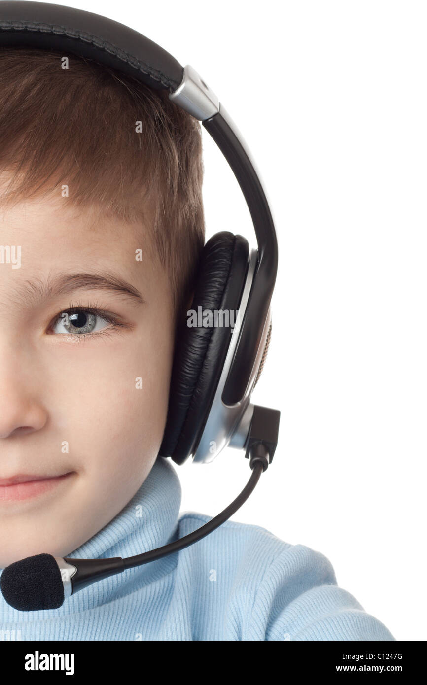 Boy in headphones with microphone over white background Stock Photo - Alamy