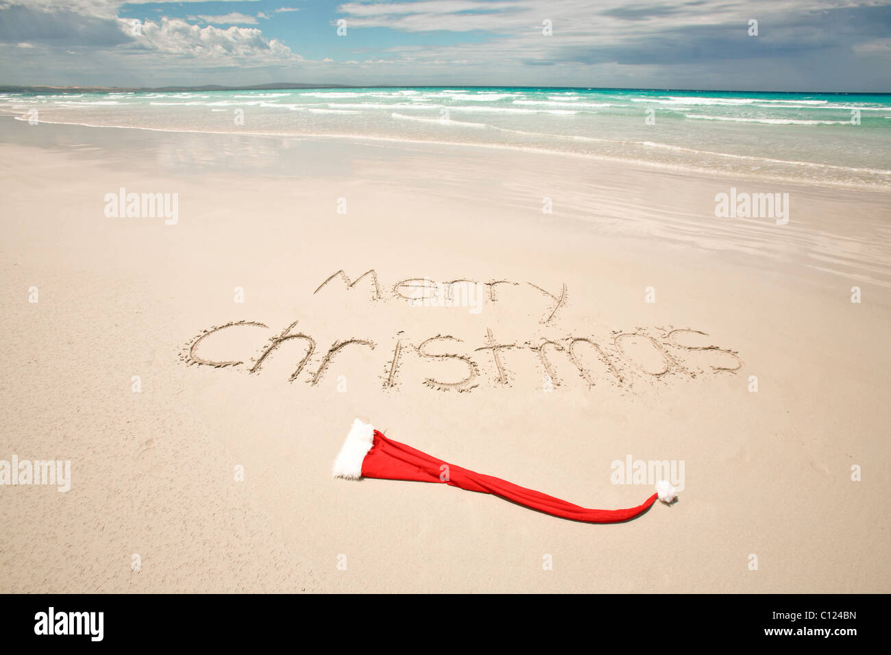 Merry Christmas written on a tropical beach Stock Photo - Alamy