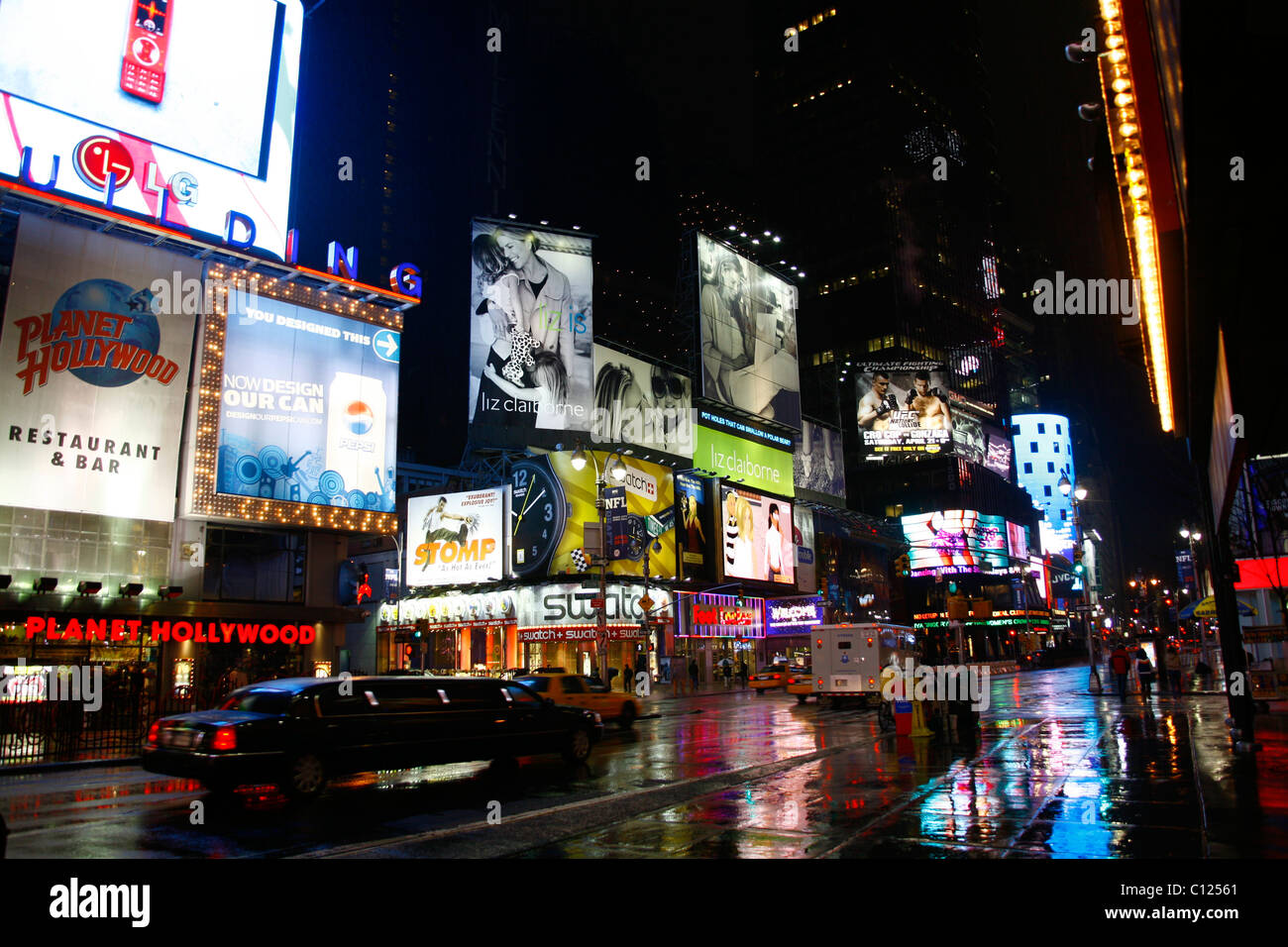 New York Times Square at night in the rain, New York, USA Stock Photo ...