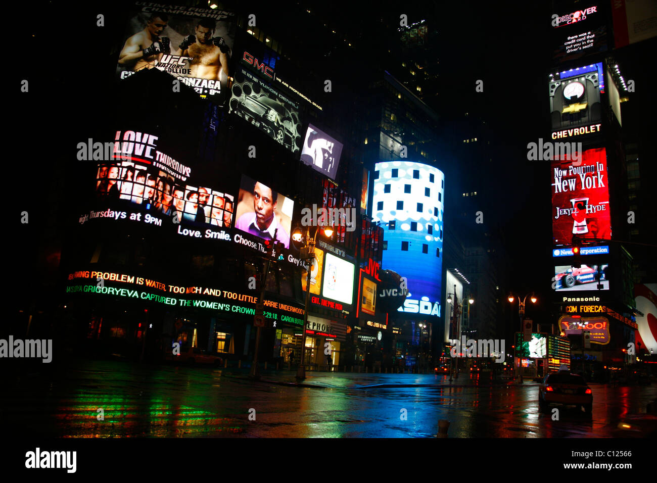 New York Times Square at night in the rain, New York, USA Stock Photo ...