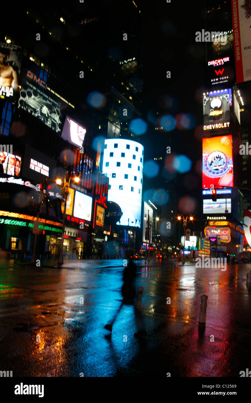 New York Times Square at night in the rain, New York, USA Stock Photo ...