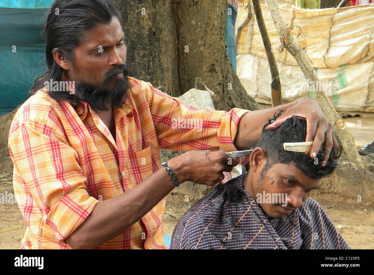 Barber shop, Rayagada village, Orissa, India Stock Photo - Alamy
