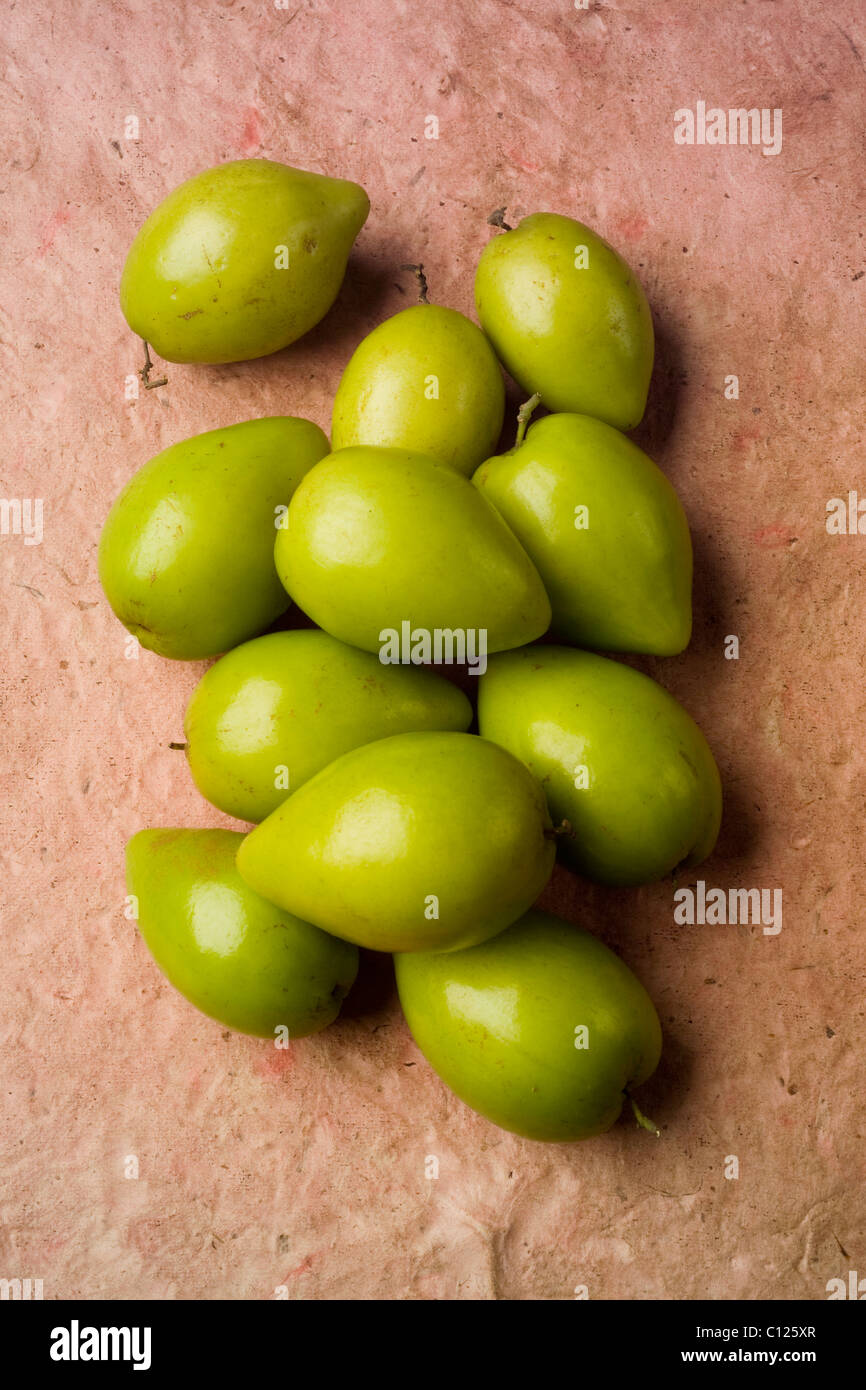 thai boroi on a brown handmade paper background Stock Photo - Alamy