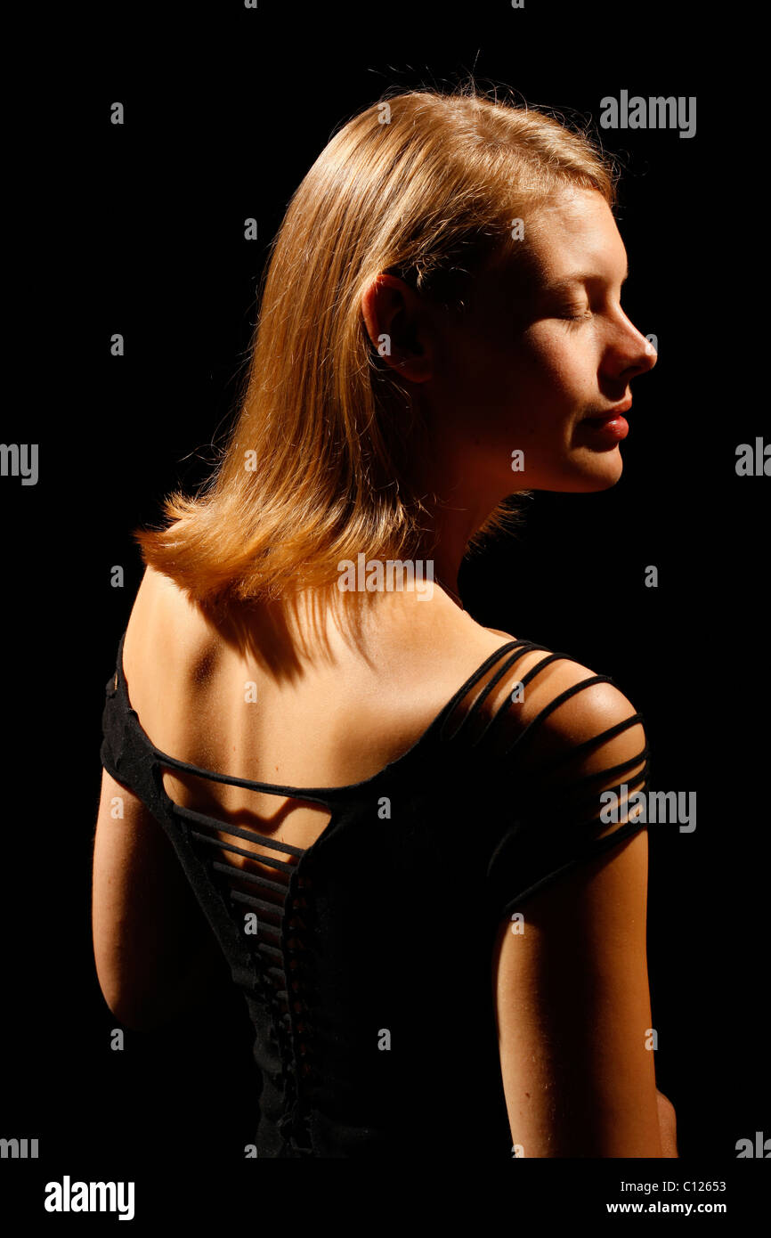 Young woman in a strapless top, back view Stock Photo - Alamy