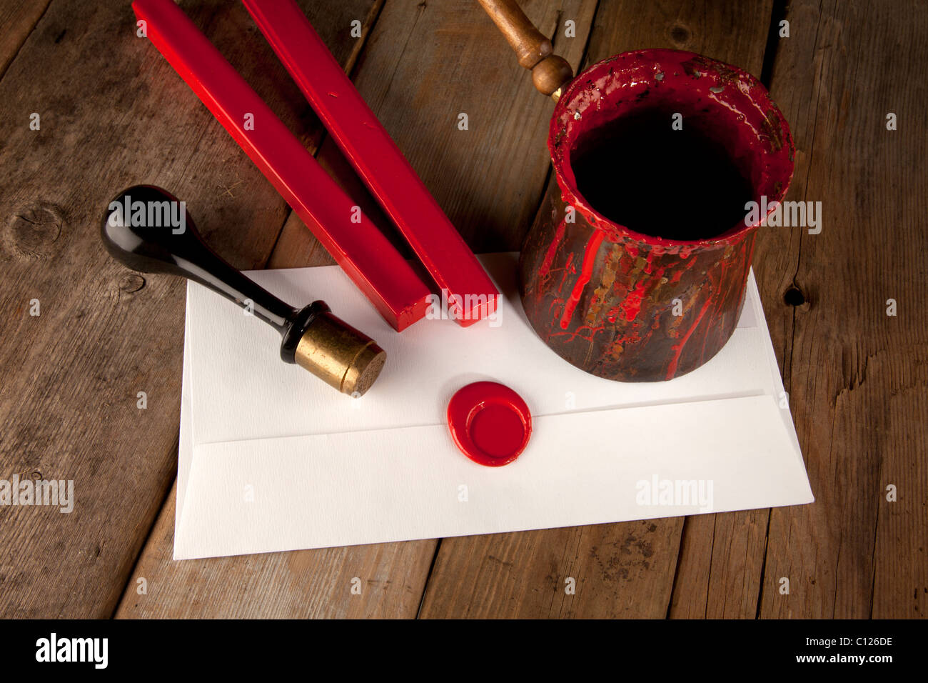 Red wax staff Stock Photo - Alamy