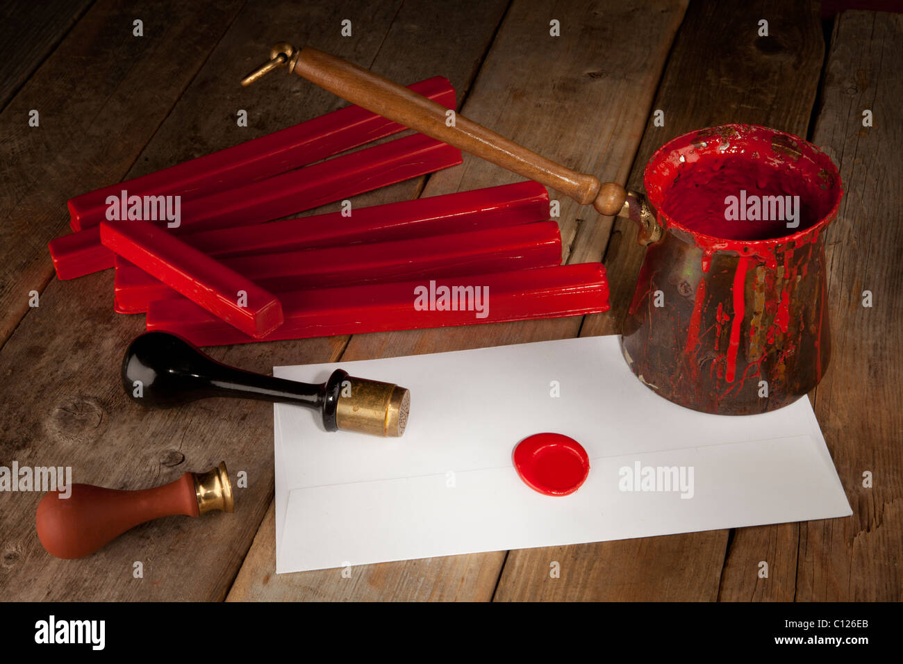 Red wax staff Stock Photo - Alamy