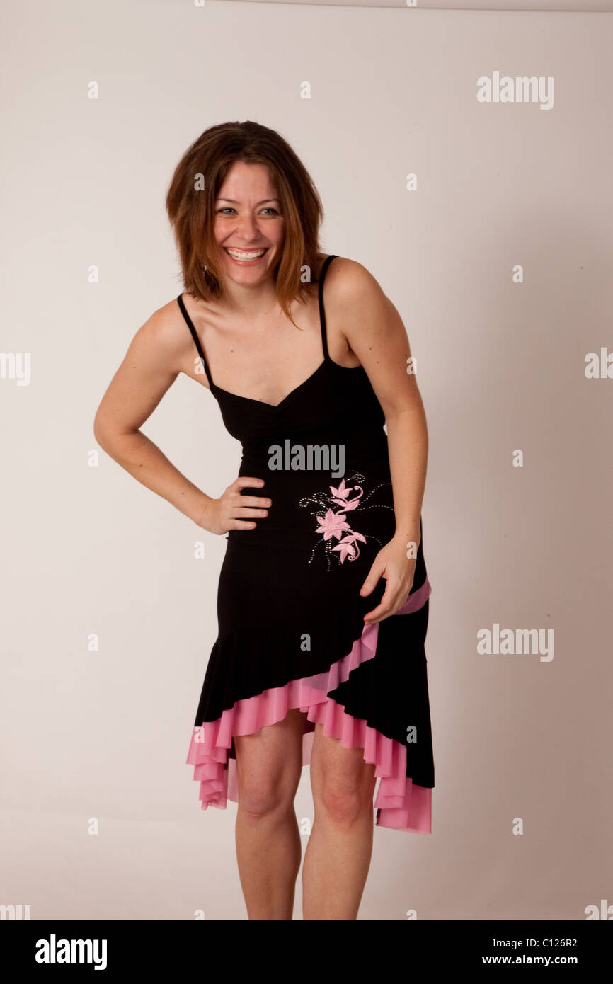 Pretty woman with a happy adn smiling expression on her face Stock ...