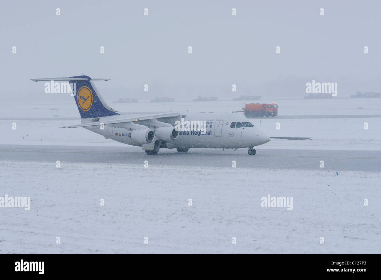 Snow, winter, Lufthansa airplane, snow removal with a jet sweeper ...
