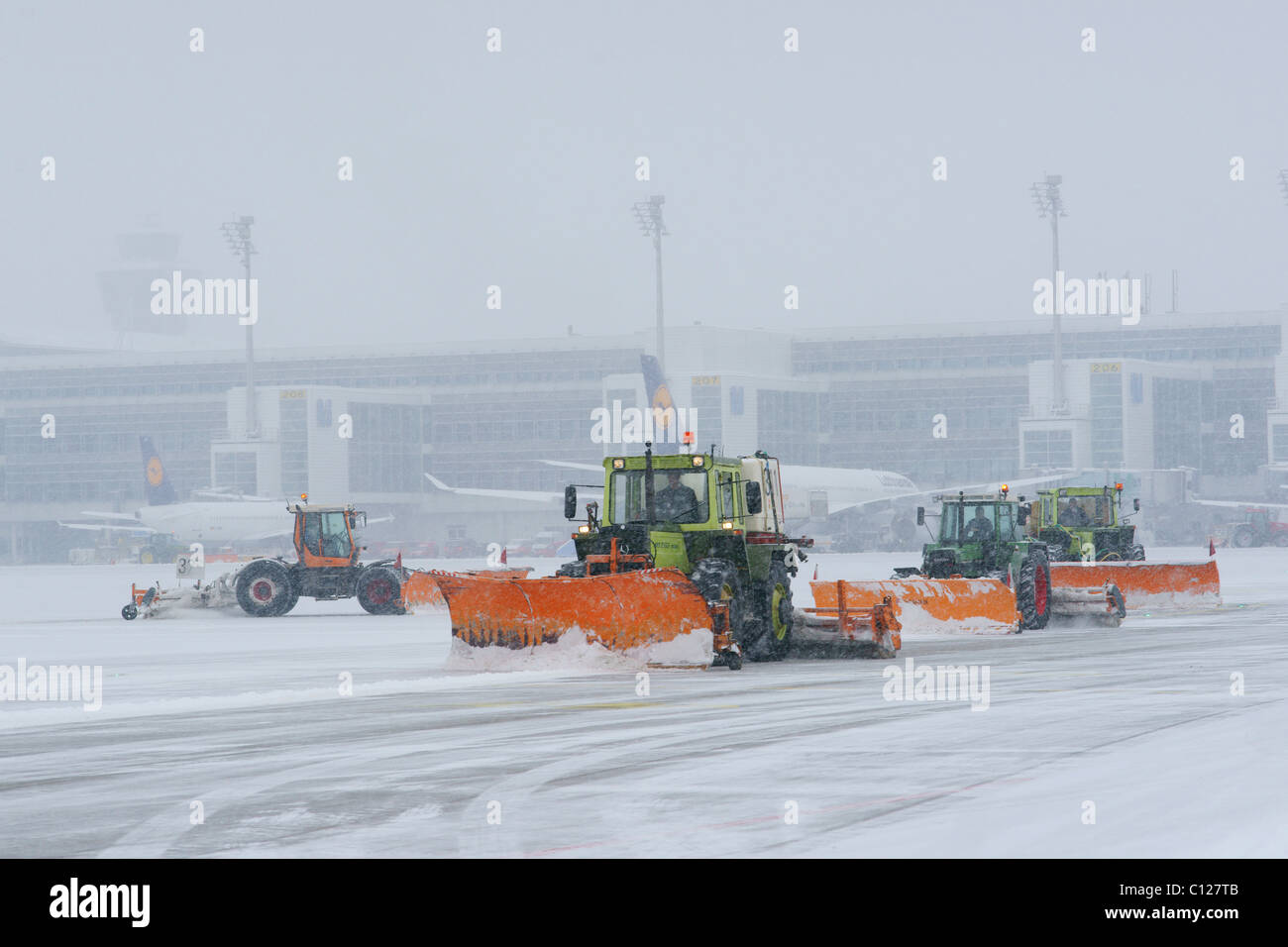 Snow, winter, snow removal with tractors, aircraft, taxiway, Terminal 2 ...