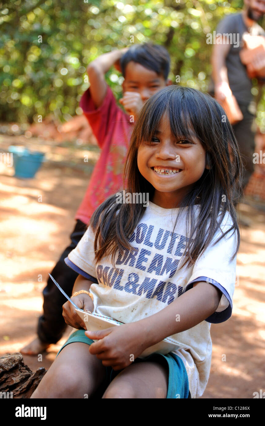 Two children, belonging to a semi-nomadic hilltribe people known as the ...
