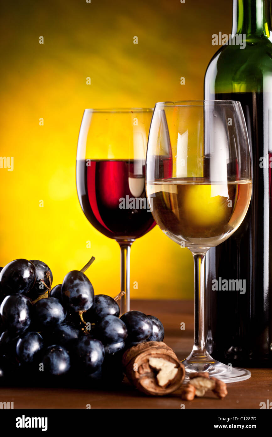 Still life with glass and bottle of wine Stock Photo - Alamy