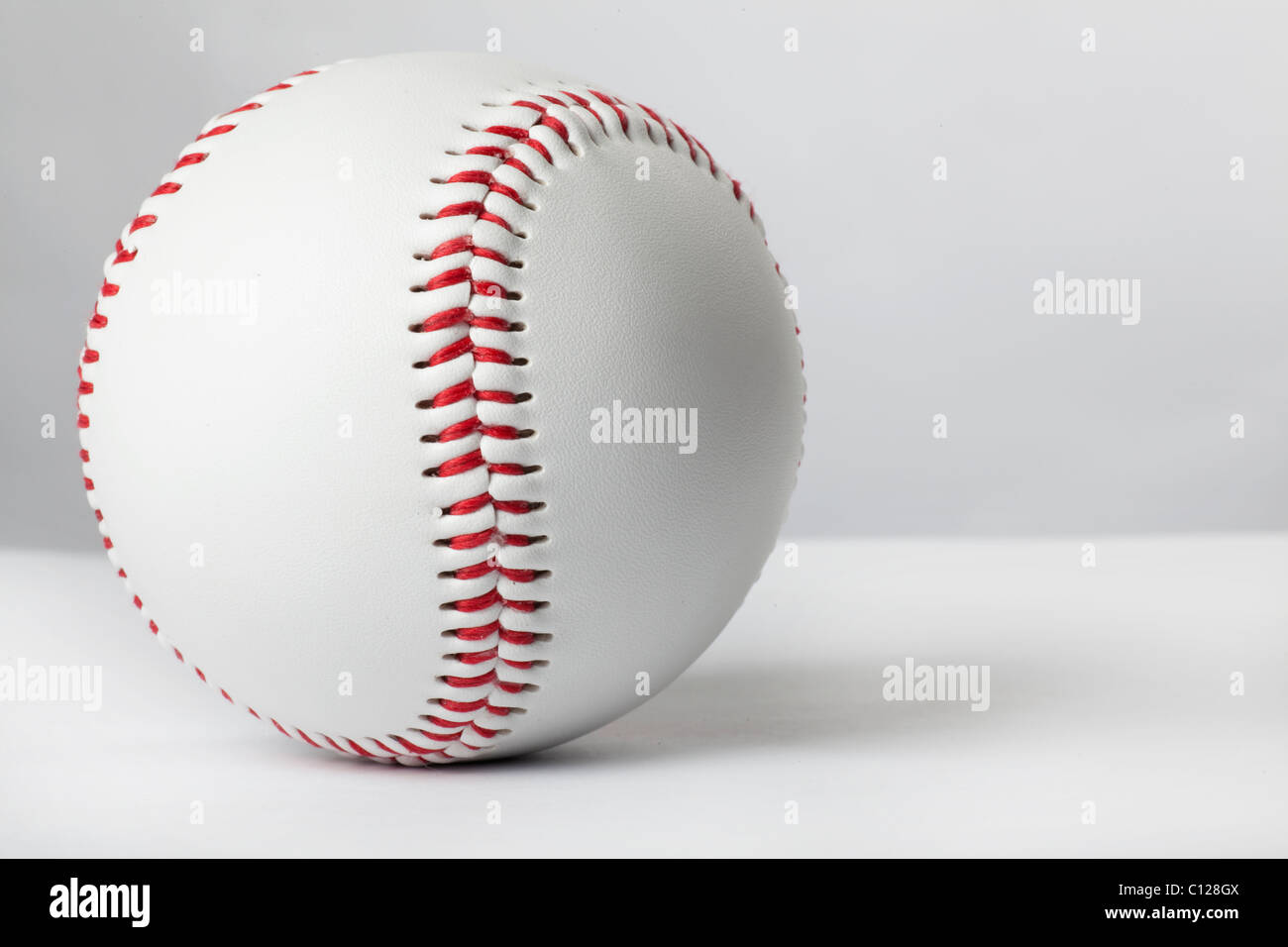 Baseball ball on the white table Stock Photo - Alamy